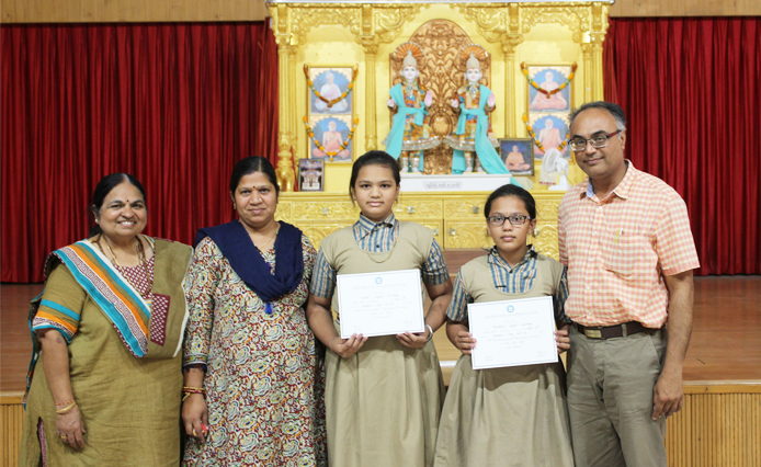 Certificates to Class Toppers, Randesan, India